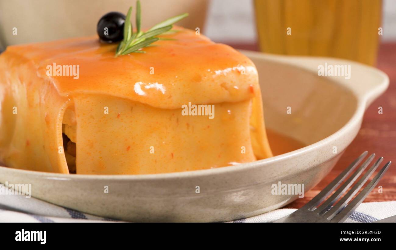 Traditional Portuguese snack food. Francesinha sandwich of bread ...