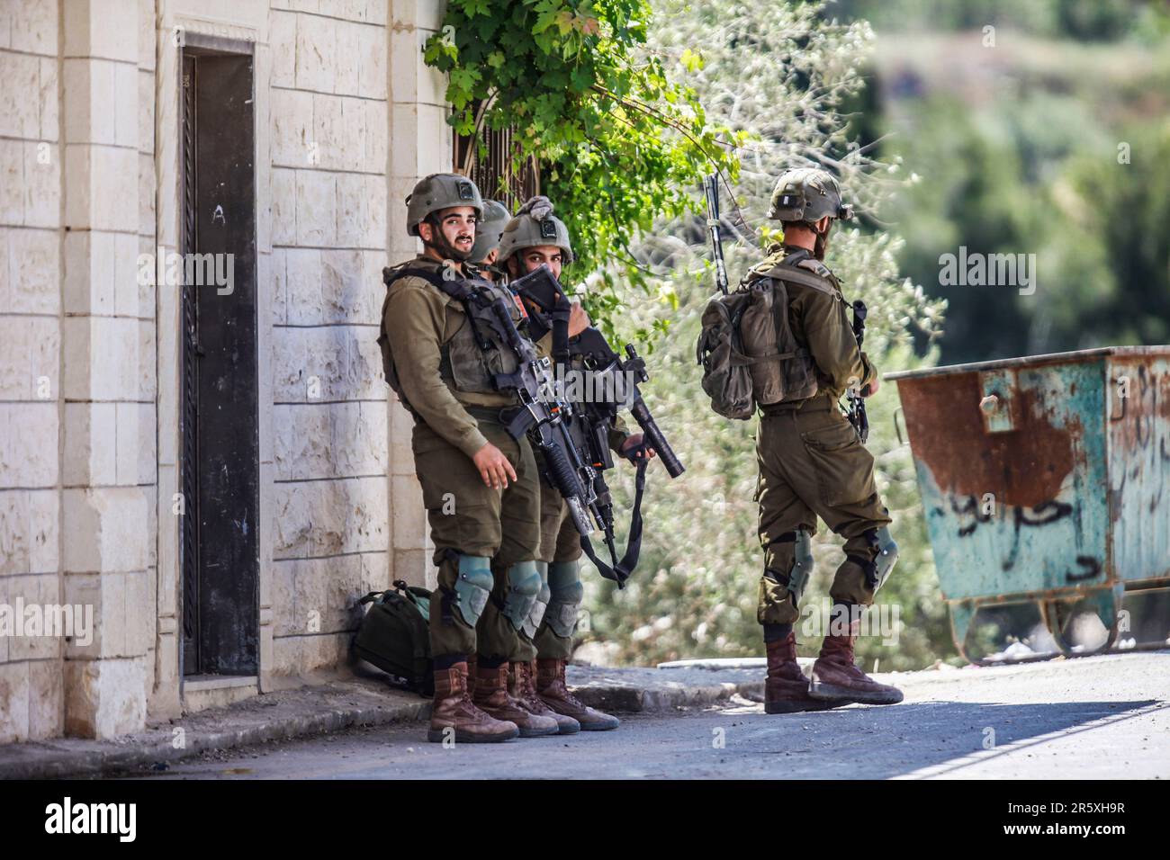 Nablus, Palestine. 05th June, 2023. Israeli soldiers stand alert at a ...