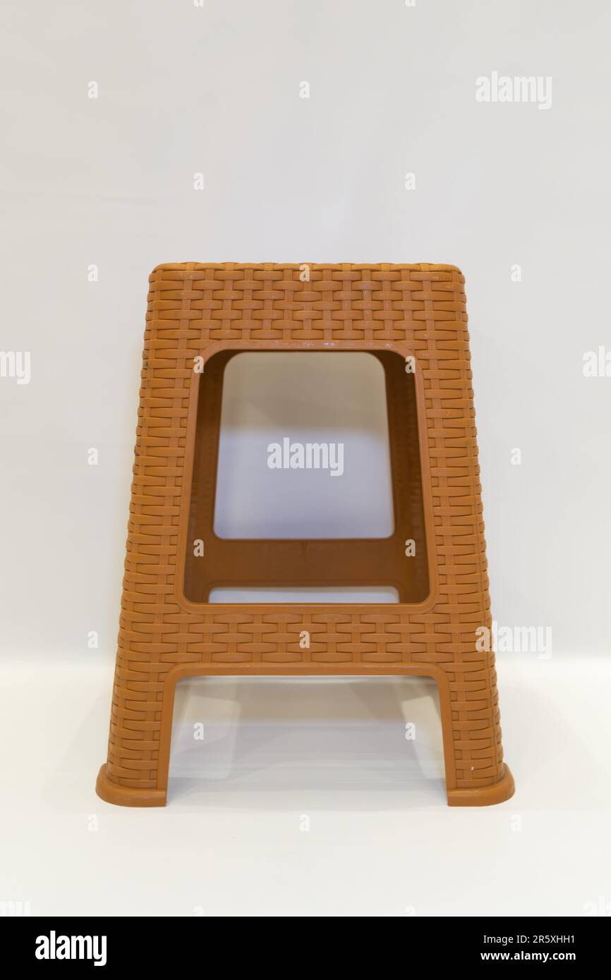 The Brown Woven Pattern Plastic Chair is a stylish and practical ...