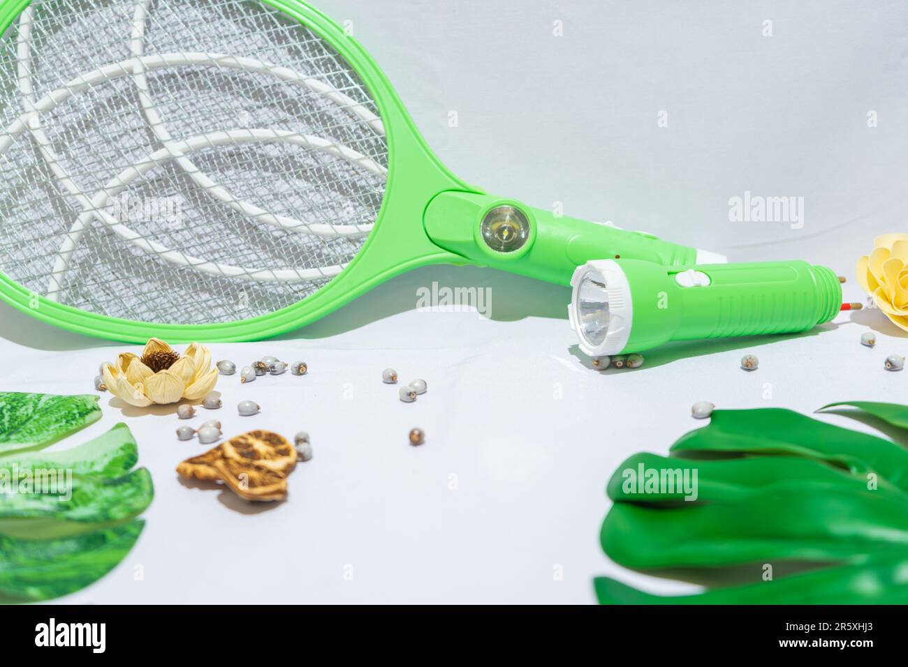 The Green Electric Mosquito Swatter Racket is a highly efficient and ...