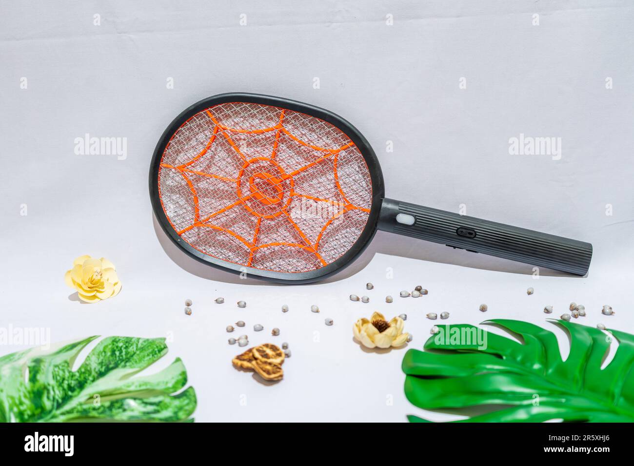 The Electric Insect Eliminator Racket in black is a powerful and ...