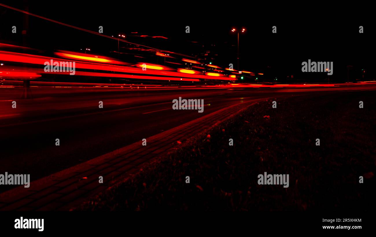 Lights of cars at night. Street line lights. Night highway city. Long ...