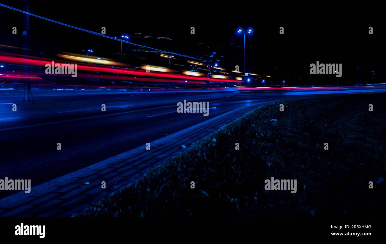 Lights of cars at night. Street line lights. Night highway city. Long ...