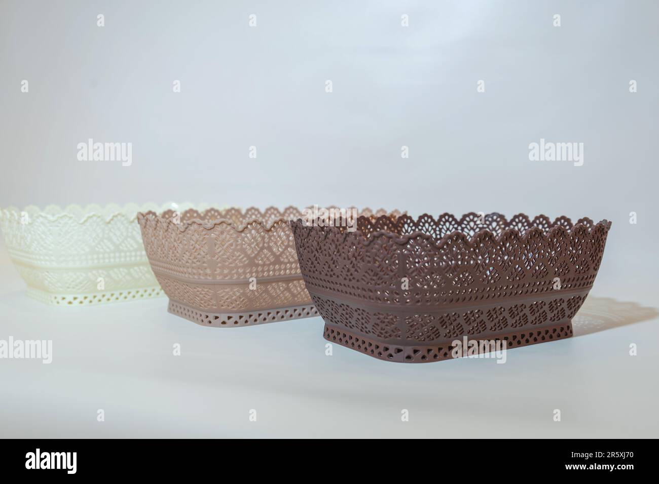 The White, Cream, and Brown Plastic Box Basket is a versatile storage ...