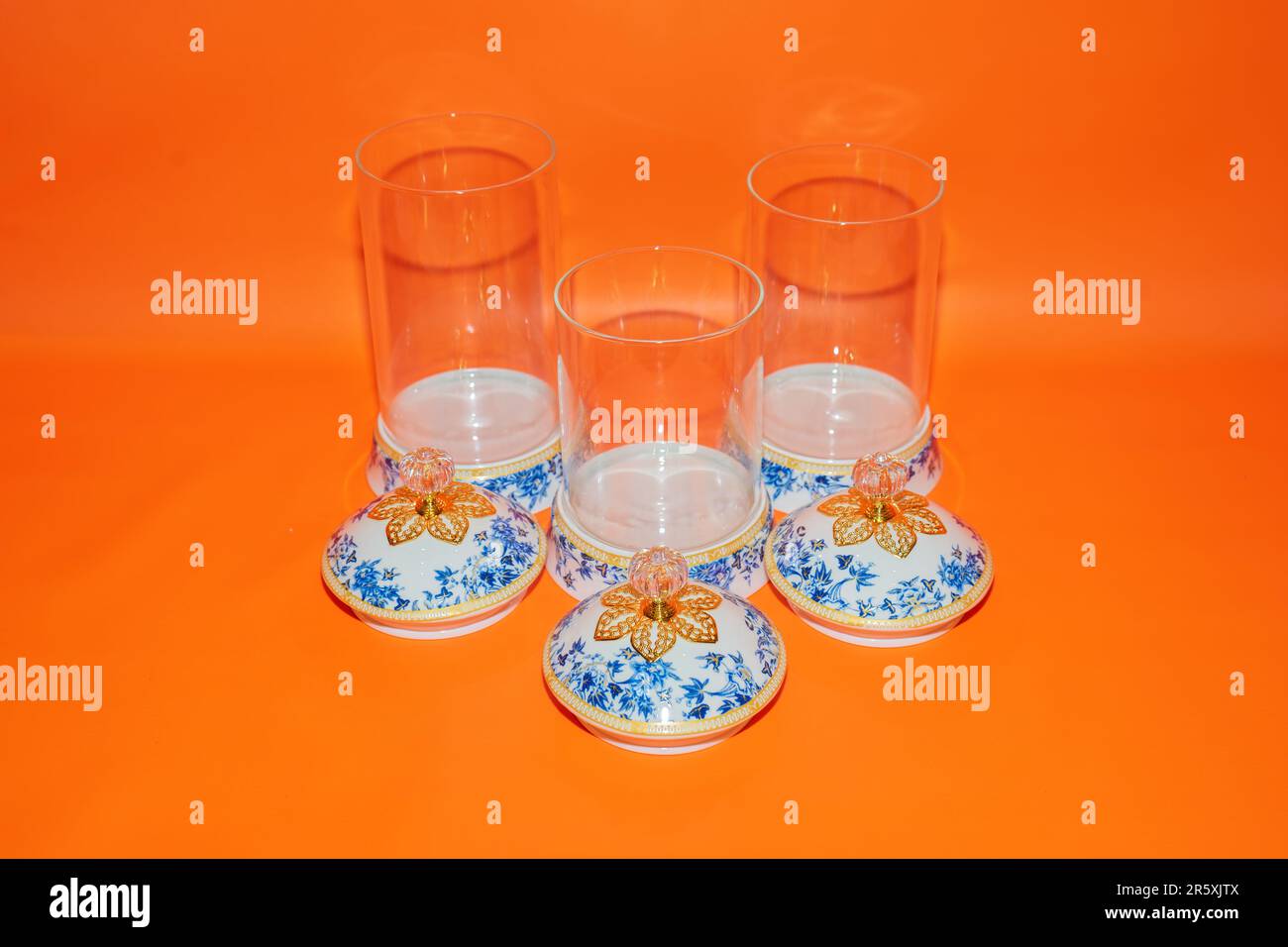 The Set of Three Glass Jars with Blue Flower Pattern White Lids offers ...