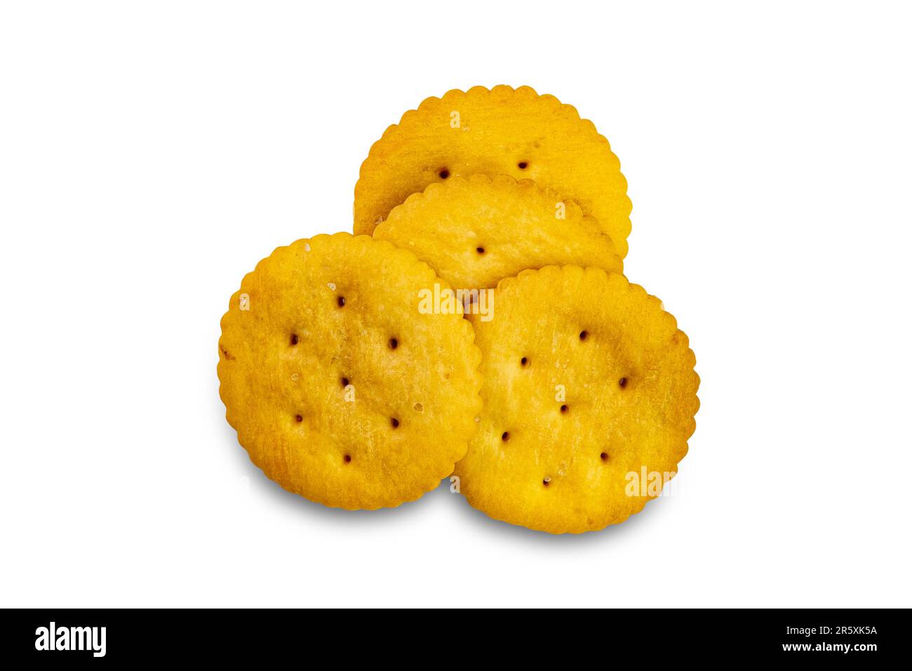 Top view closeup of delicious salted round crackers isolated on white ...