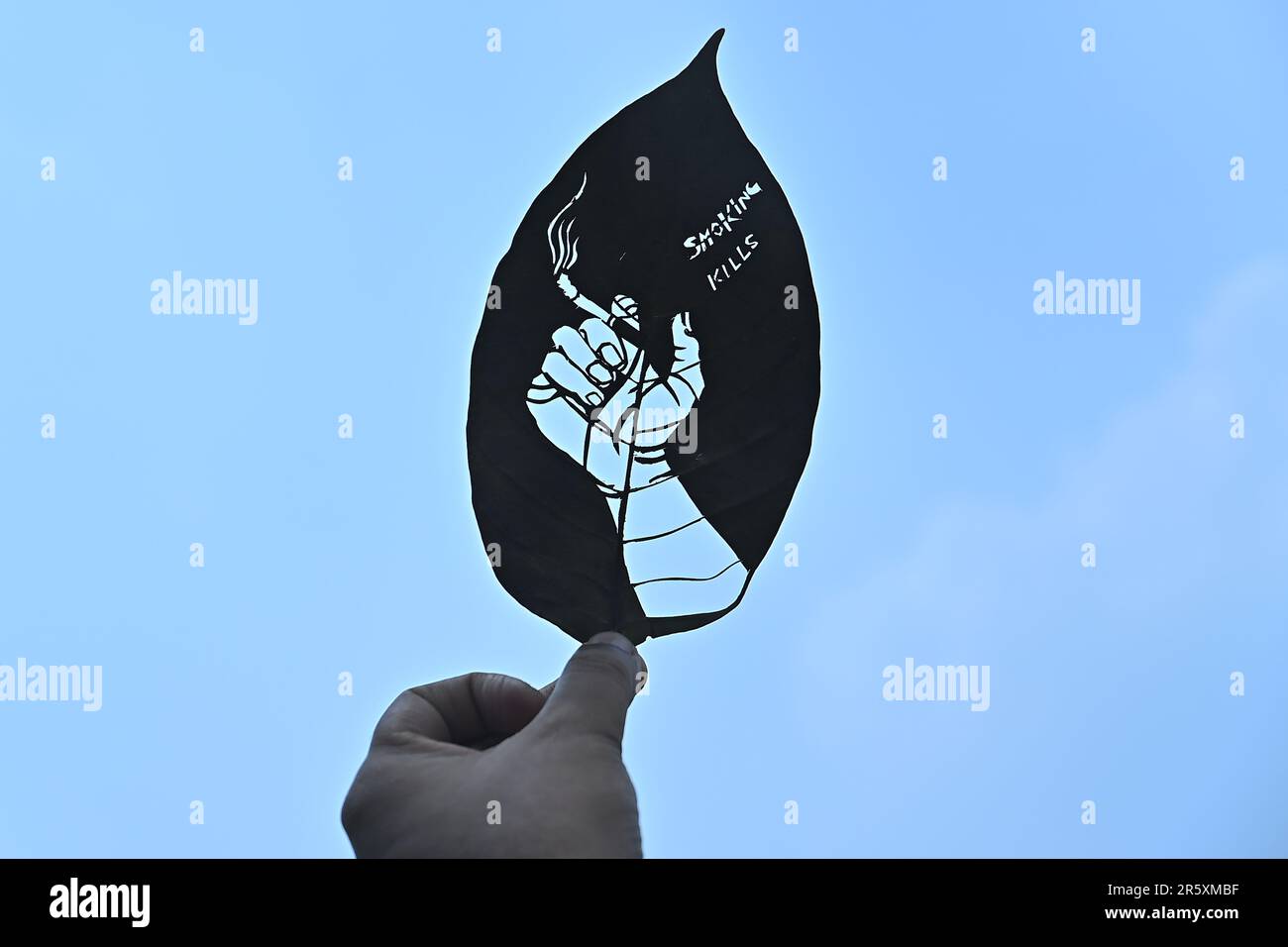 Leaf artist Subham Saha shows his creation depicting the theme of ...