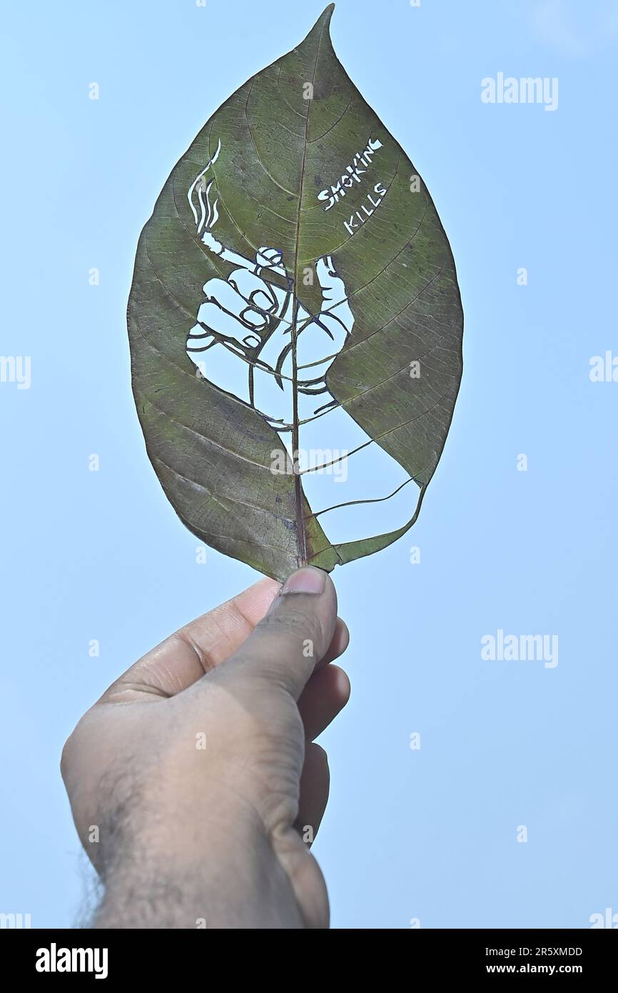 Leaf artist Subham Saha shows his creation depicting the theme of ...