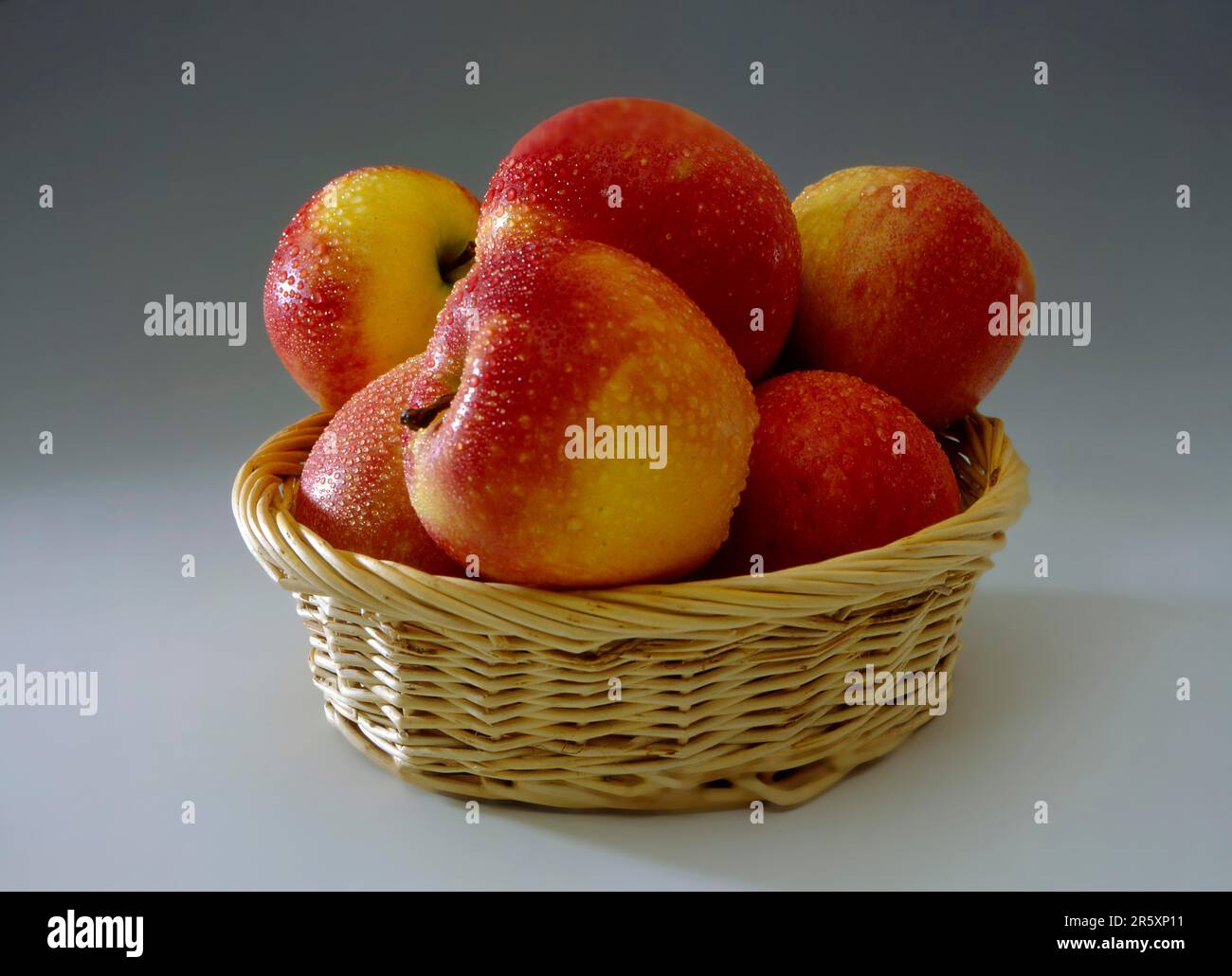 Apples in a basket, Gala and Elstar Stock Photo - Alamy