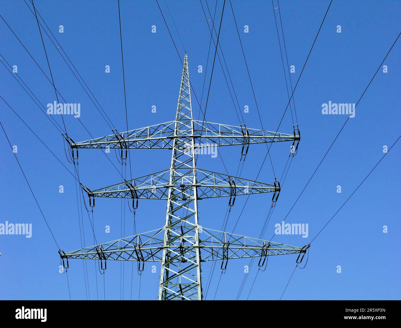 Power pylons in the field, power lines, overhead power line, supply ...