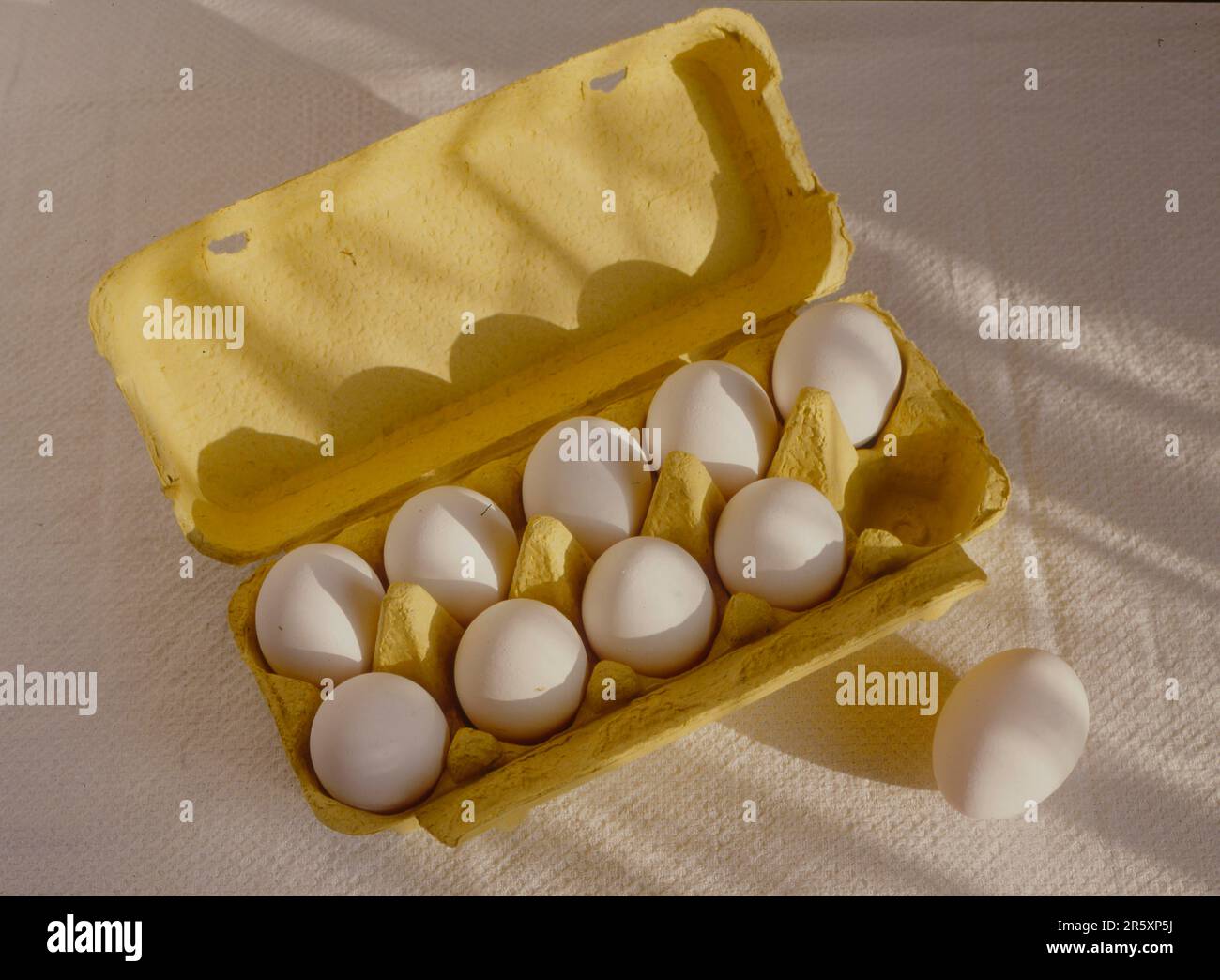 9 eggs in a carton, 10 pack Stock Photo - Alamy