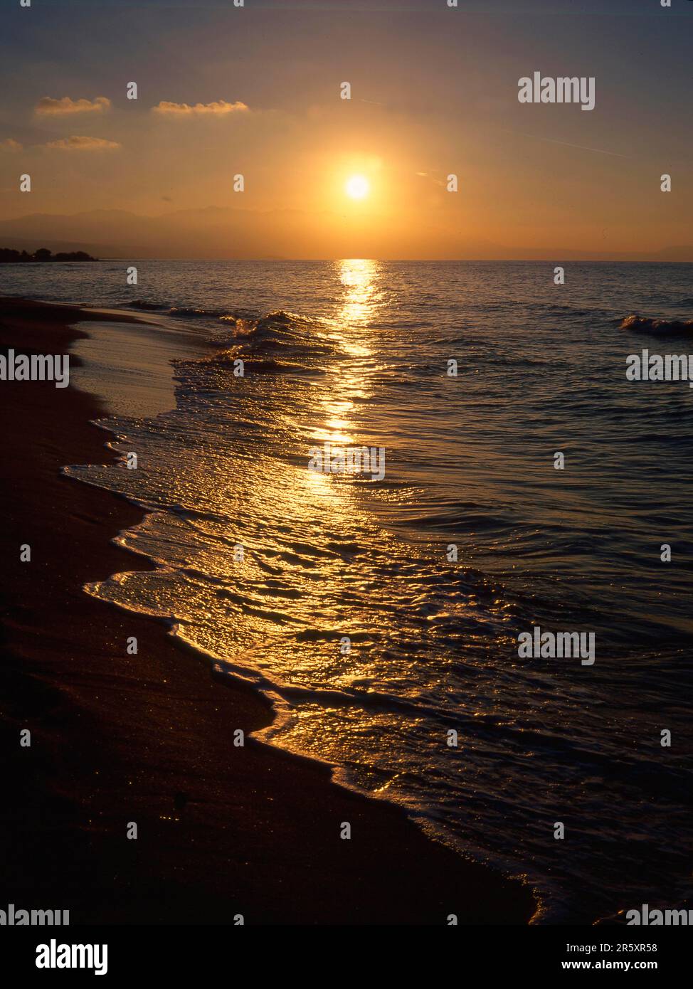 Sunset on the beach at Rethimnon Crete Greece Stock Photo - Alamy