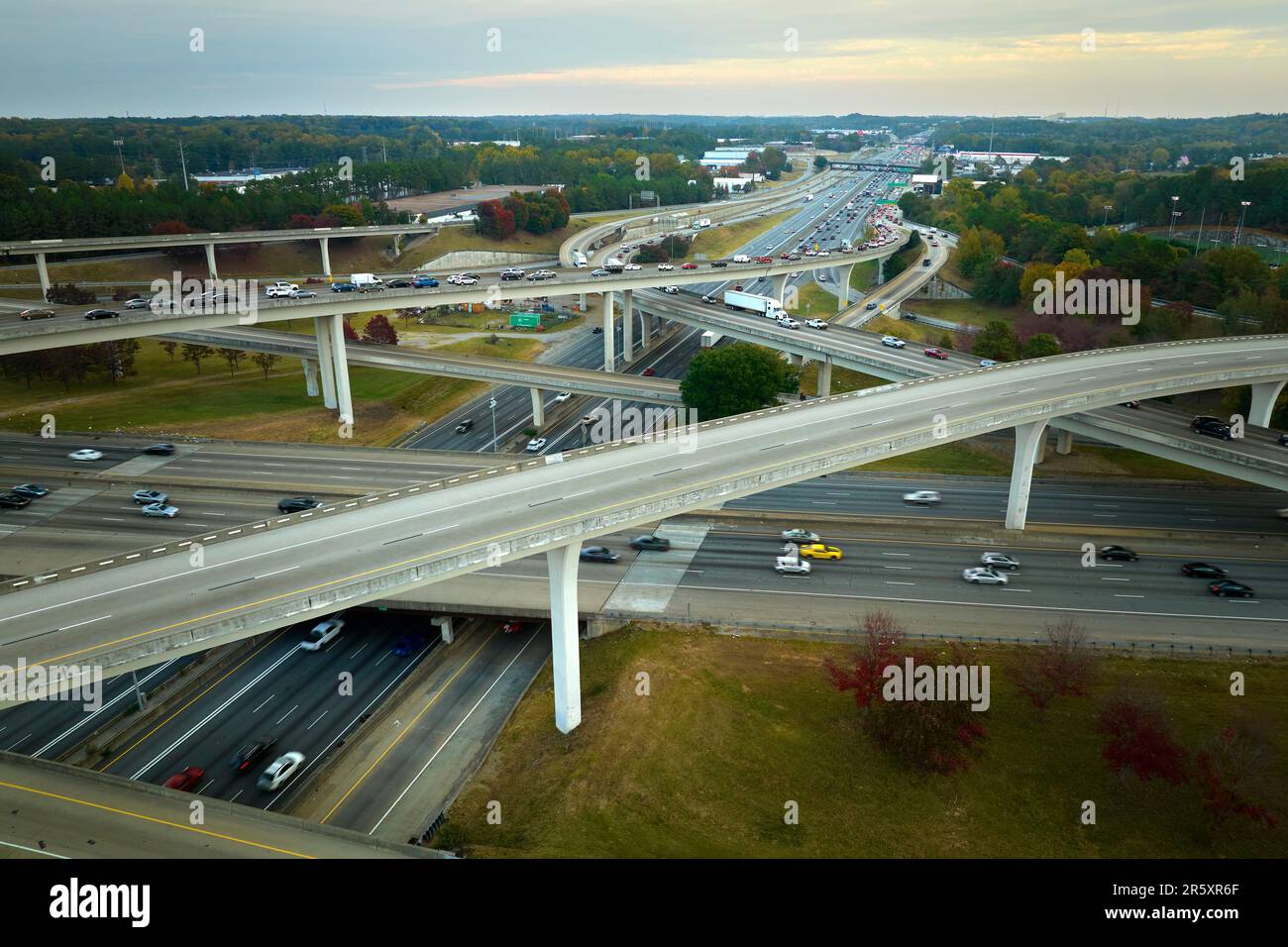 Aerial view of american freeway intersection with fast moving cars and ...