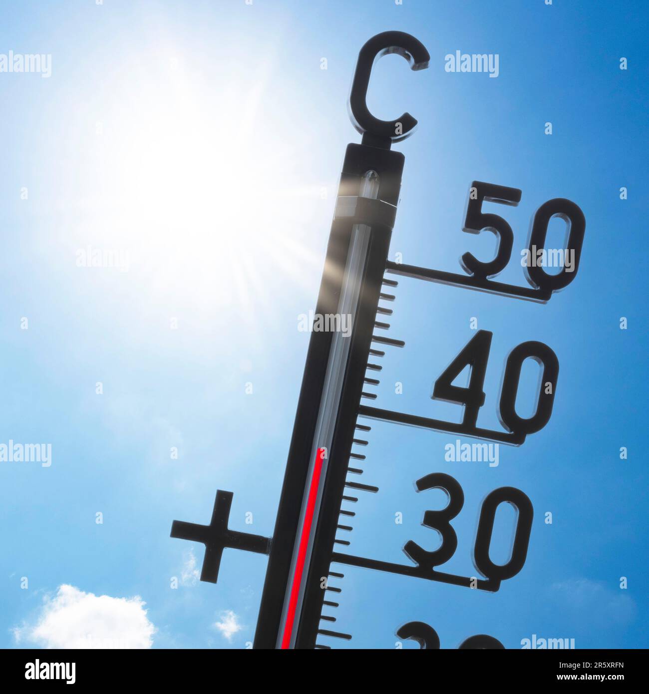 Symbolic image, global warming, thermometer in front of sun and clouds ...