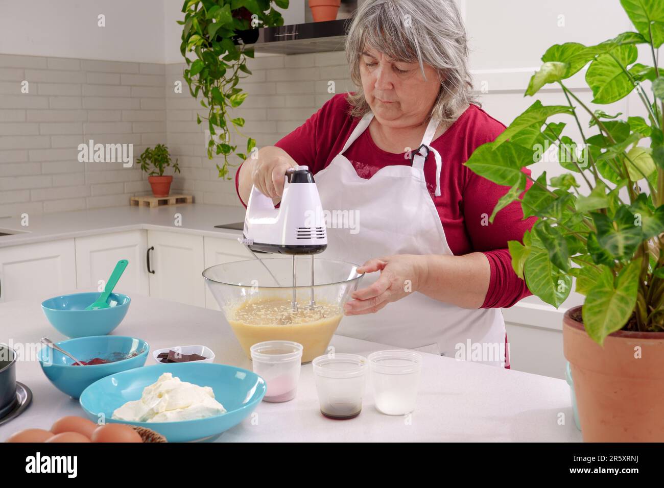Chef beating hi-res stock photography and images - Alamy
