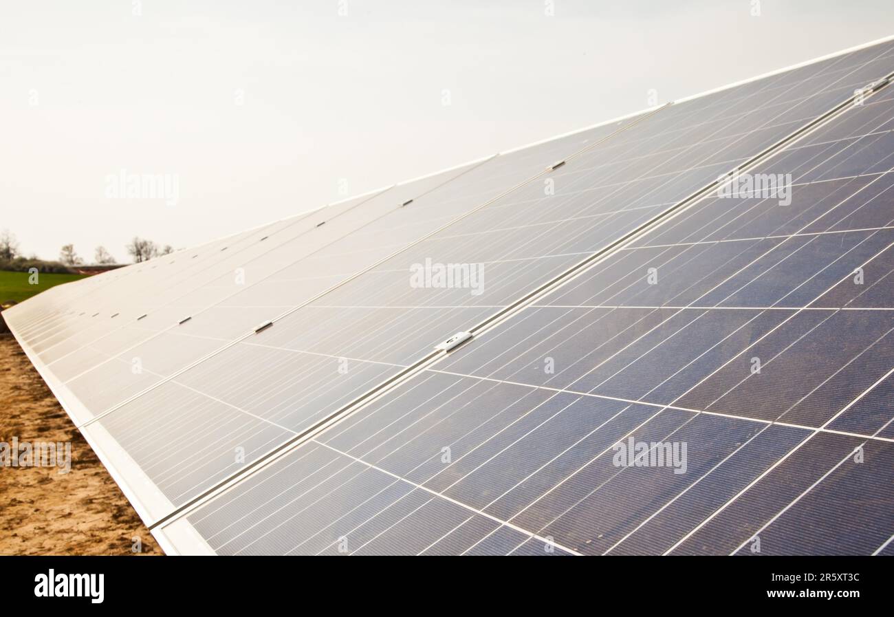 Works in progress in a solar panel plant Stock Photo - Alamy