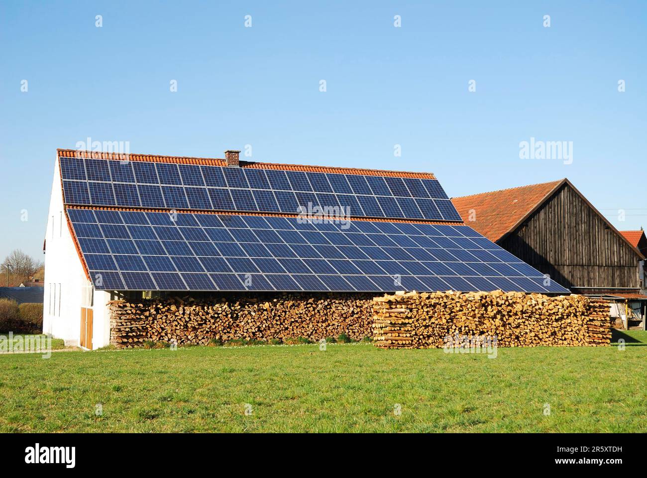 Old farm house with innovative photovoltaic installation Stock Photo ...