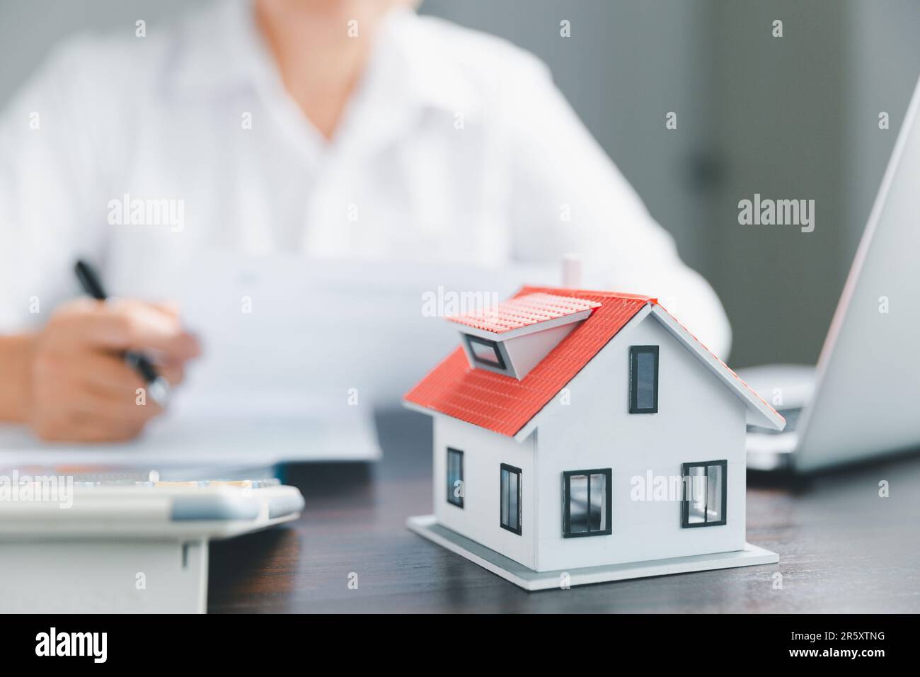 Real estate agents offer contracts to purchase or rent residential ...