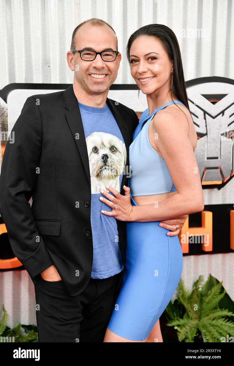 James Murray, left, and wife Melyssa Davies attend the premiere of ...