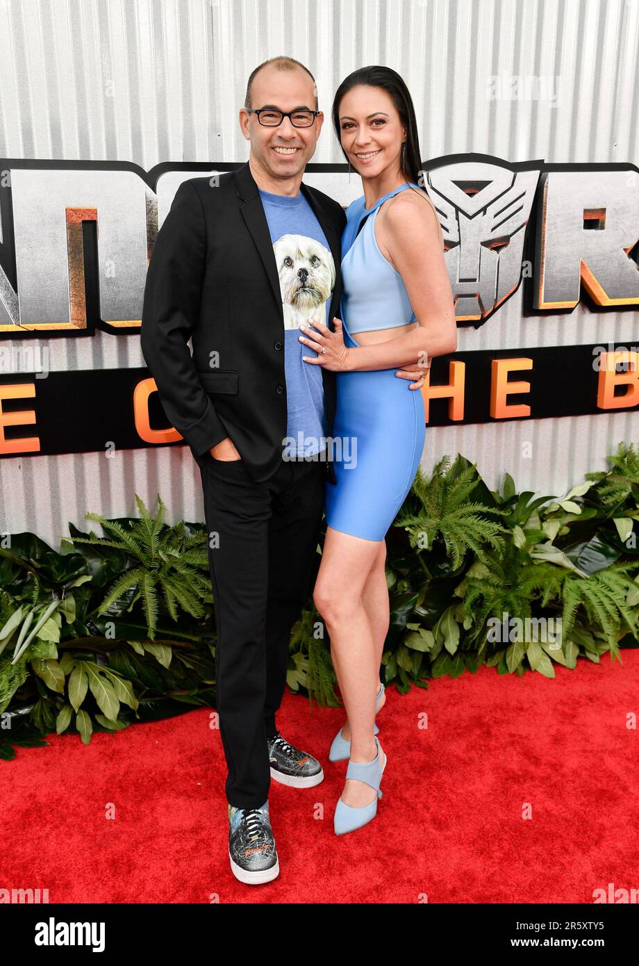 James Murray, left, and wife Melyssa Davies attend the premiere of ...
