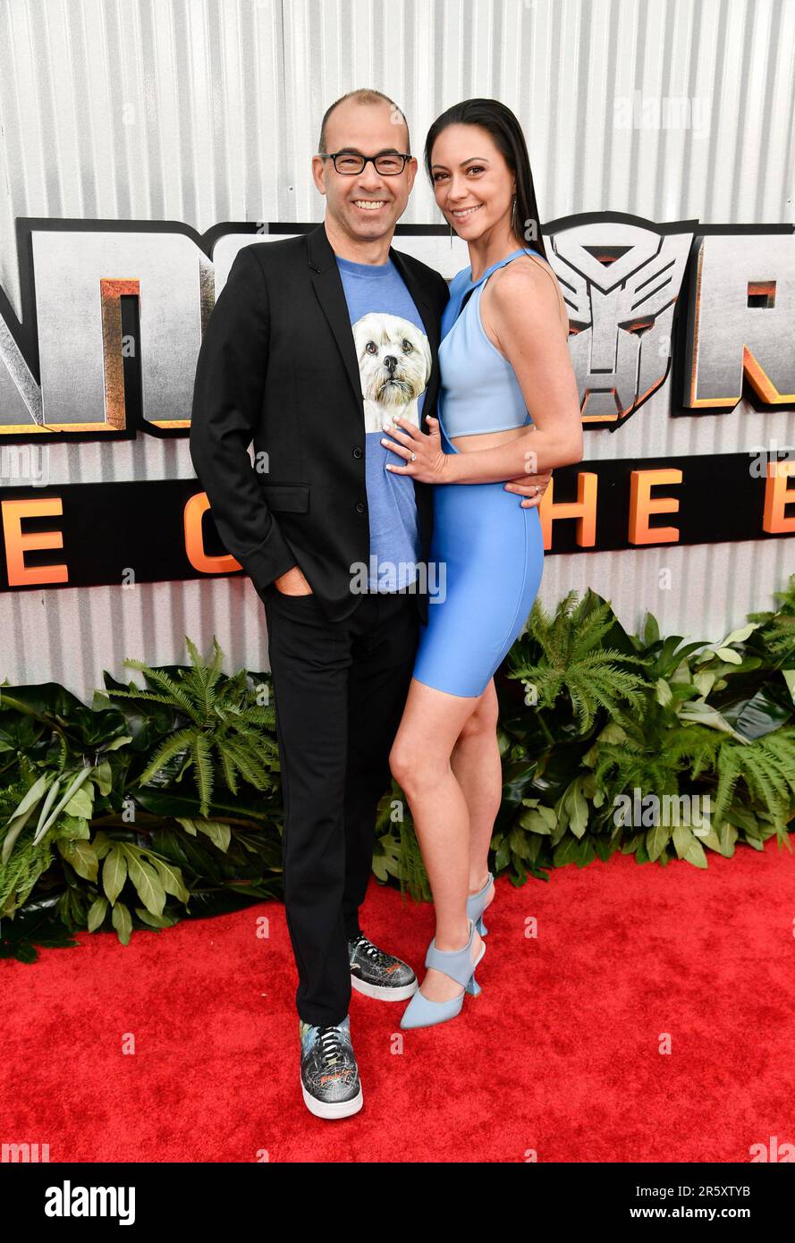 James Murray, left, and wife Melyssa Davies attend the premiere of ...