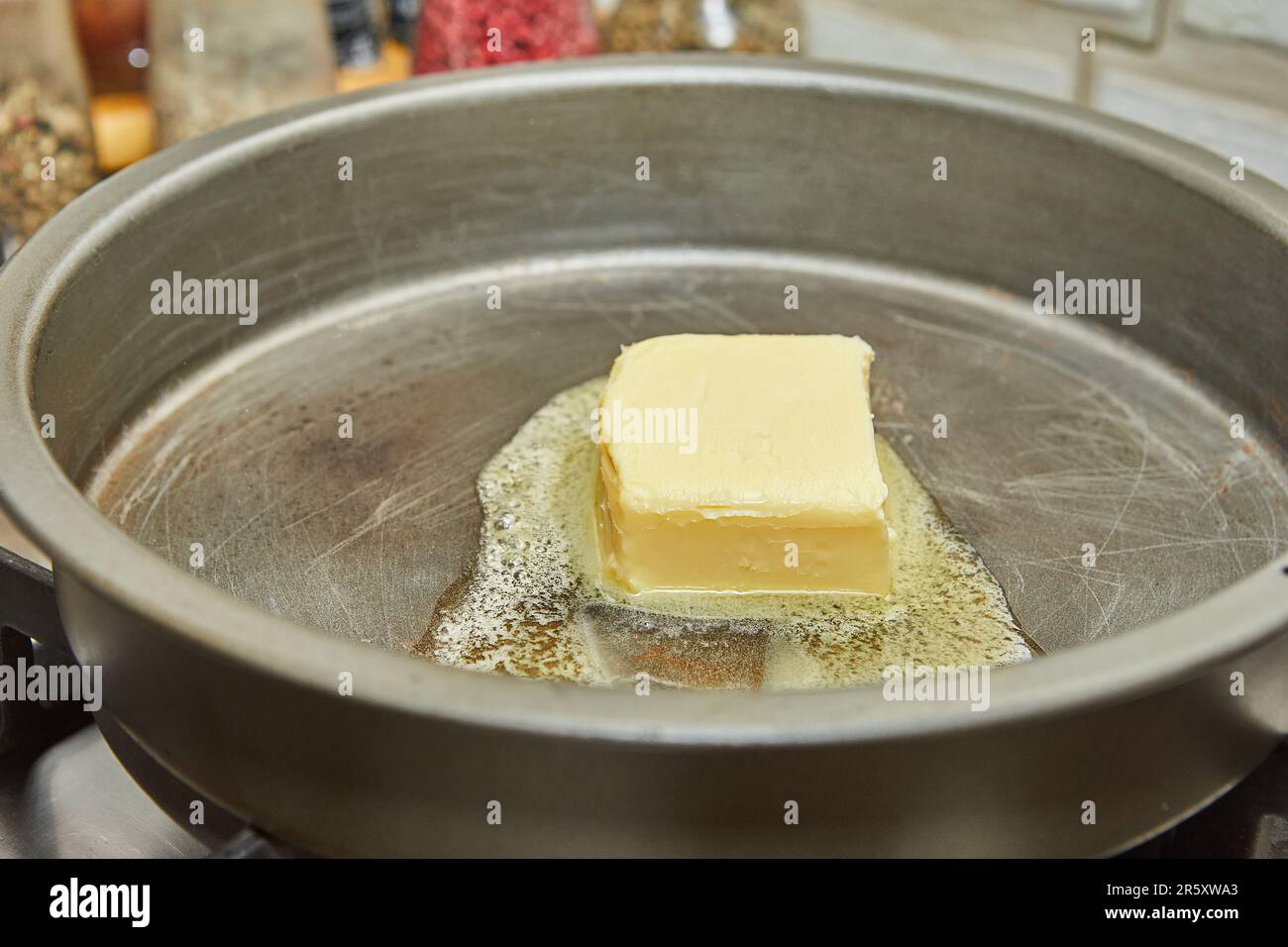 Margarine in hot frying pan hi-res stock photography and images - Alamy