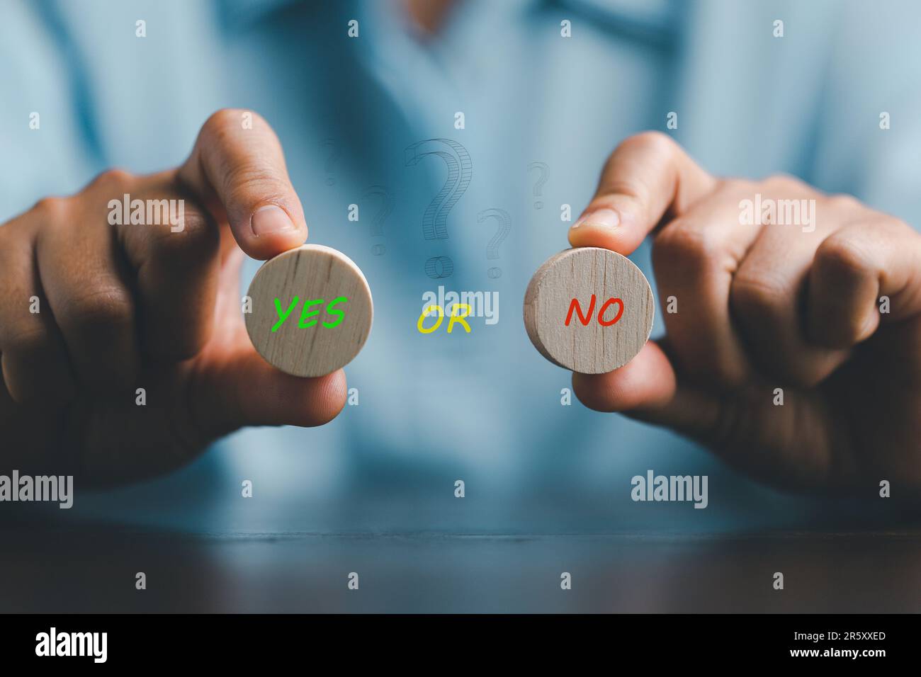 Concept of choice yes or no on wooden cubic blocks. Think with Yes or ...