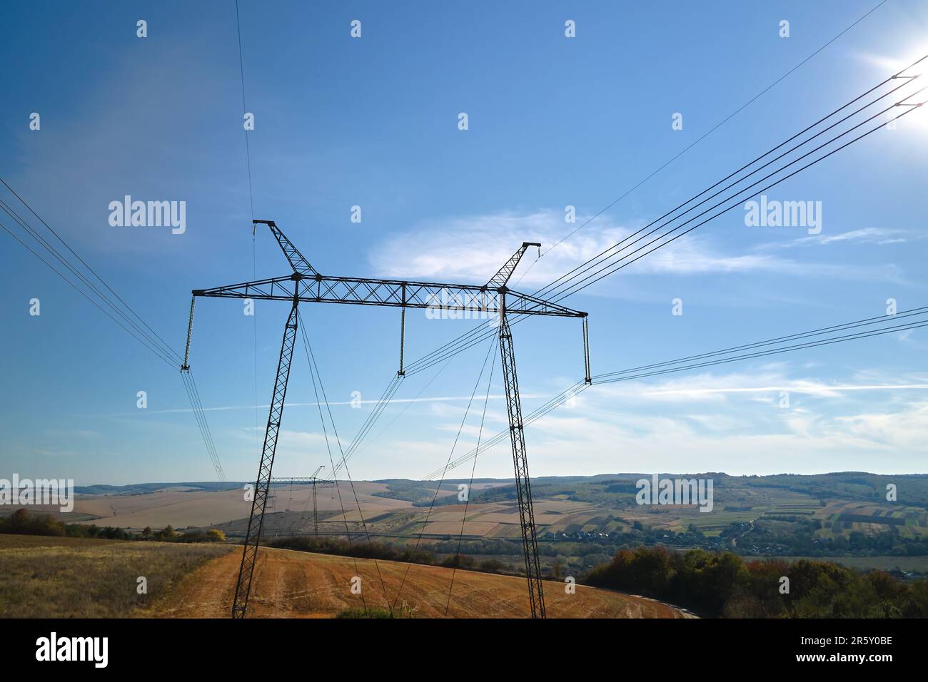 High voltage tower with electric power lines transfening electrical ...