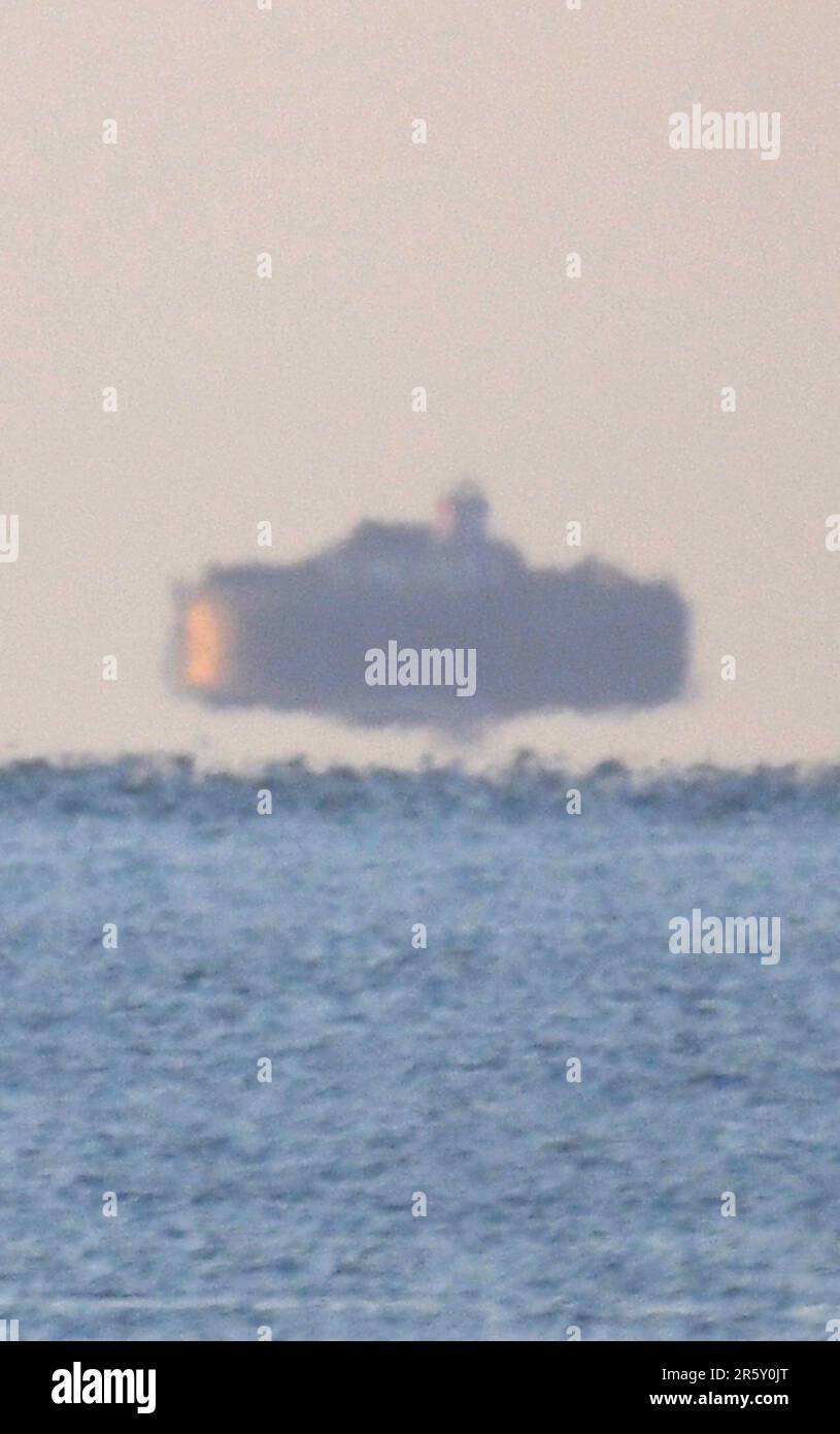 Solent sea-forts appear to be floating or flying above the horizon is ...