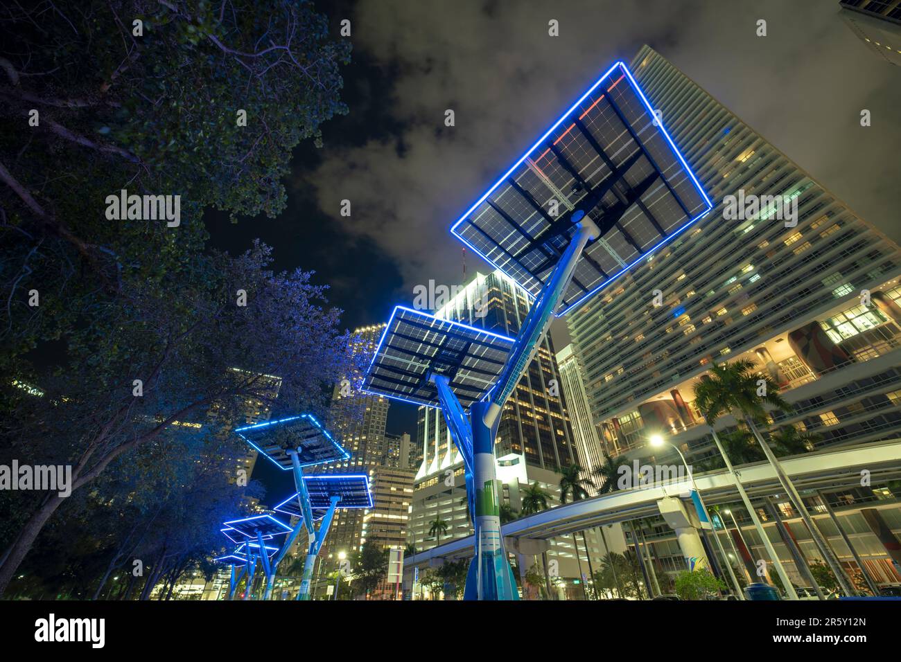 Modern urban street neon illumination with solar photovoltaic panels ...