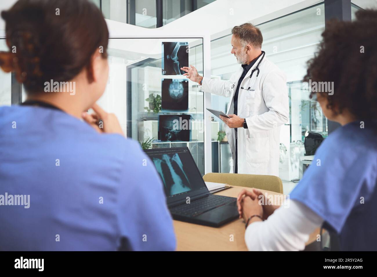 Giving his team a clear guide to their tasks and responsibilities. a ...