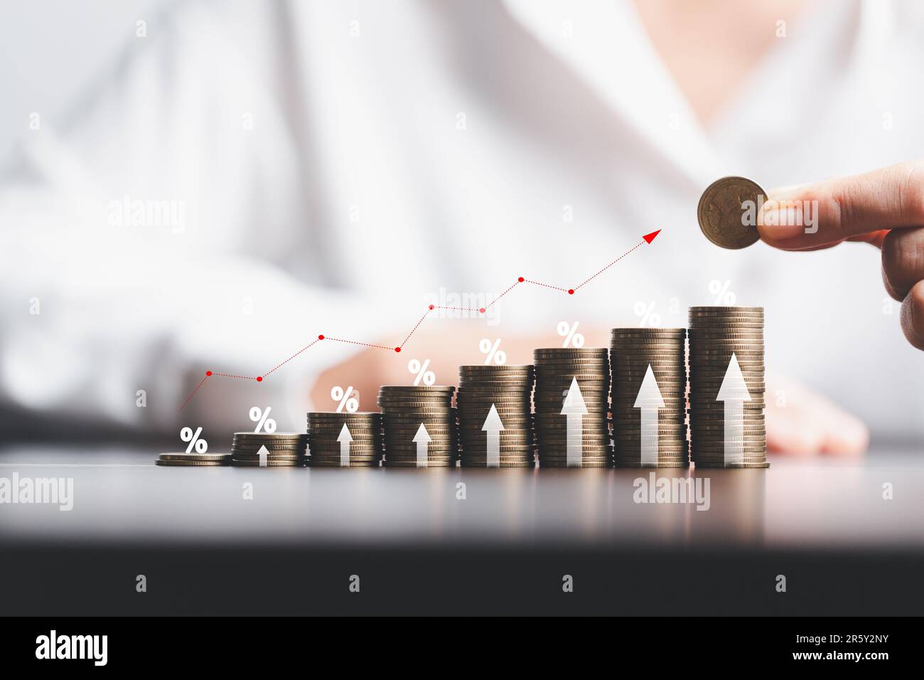 Business woman hand and stack coins money with up arrow and percentage ...