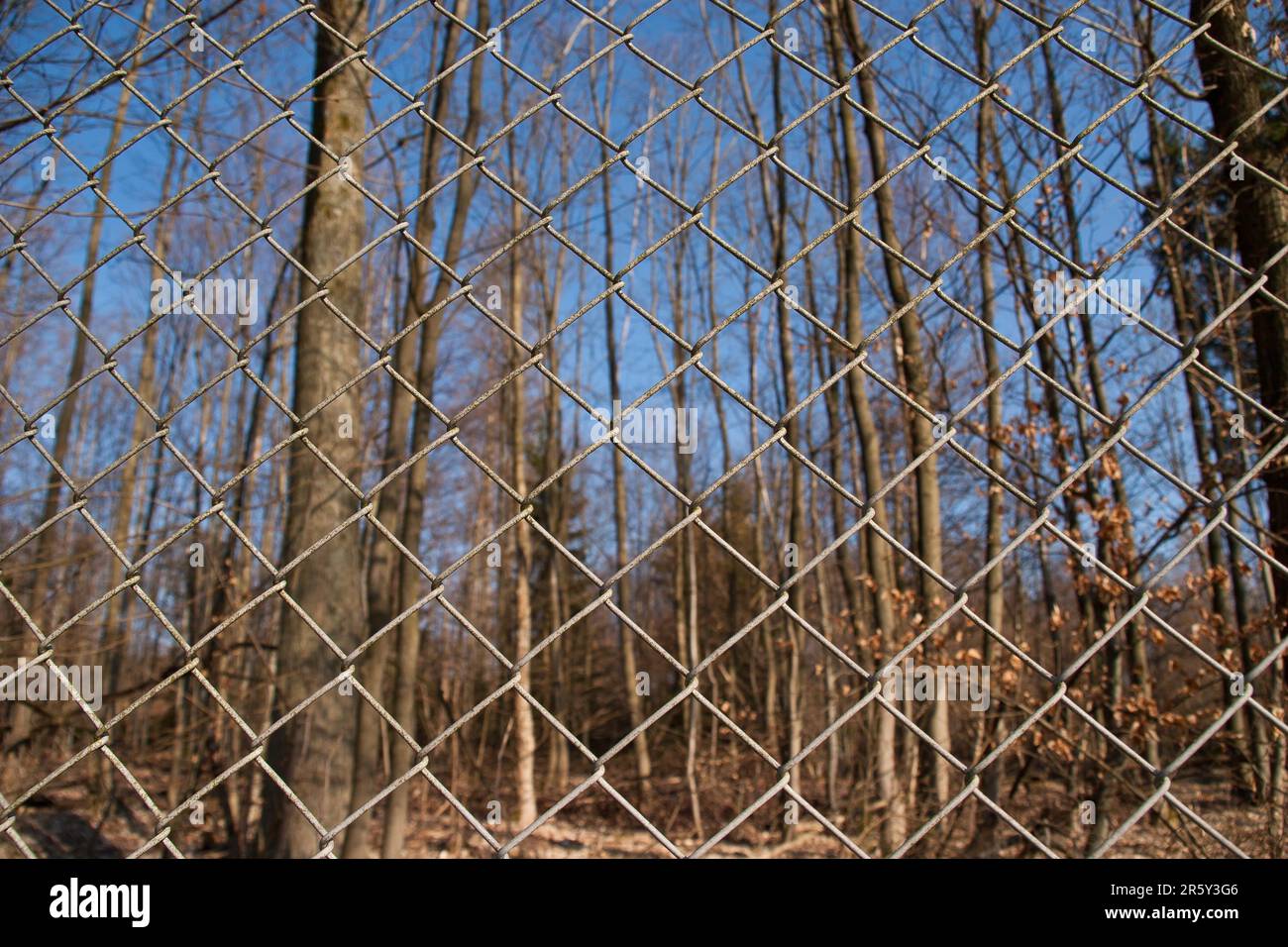 View through the fence Stock Photo - Alamy
