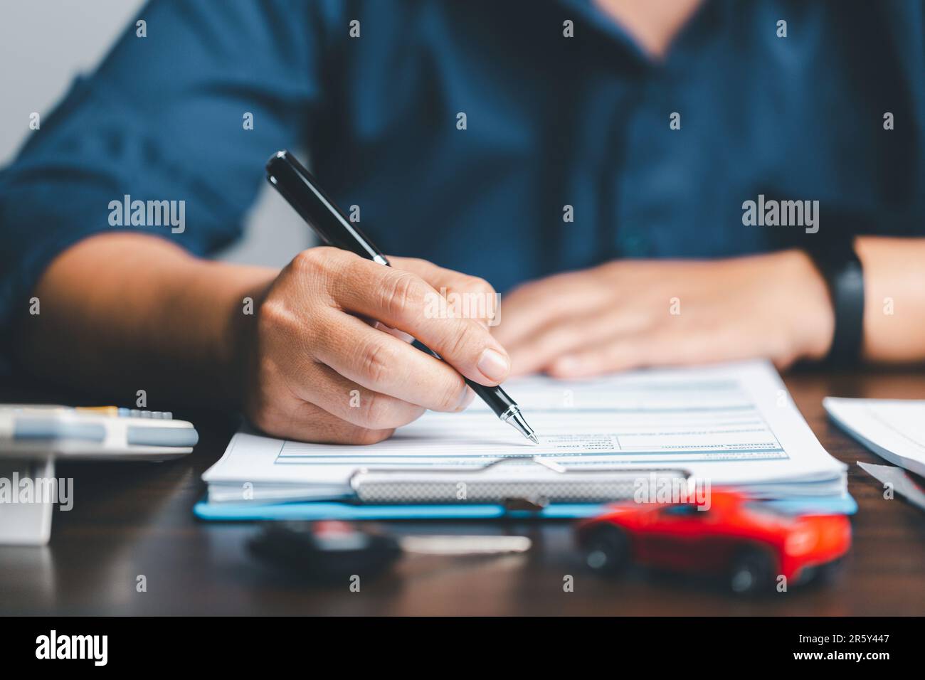 Businesswoman signing contract document. Rental contract, insurance ...