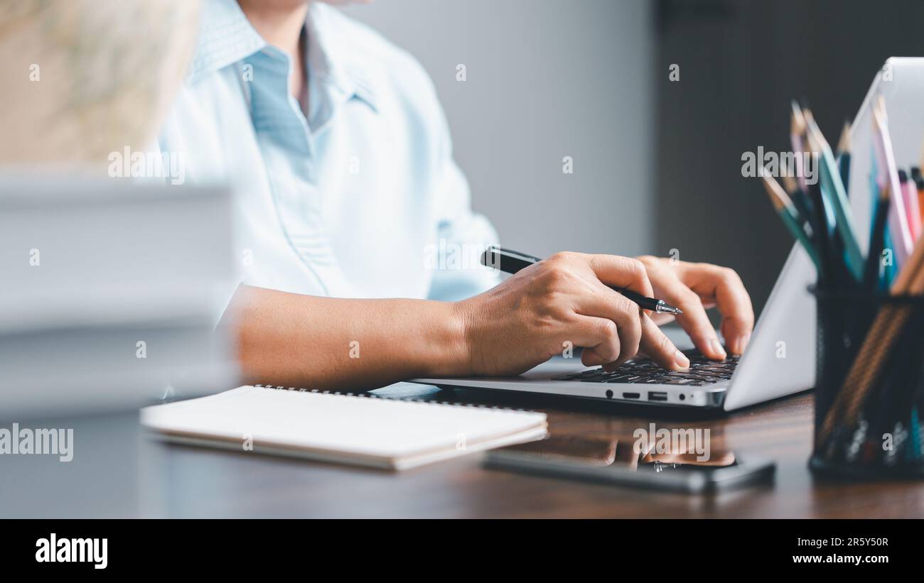 Education concept. Close up of female student make notes hand typing in ...