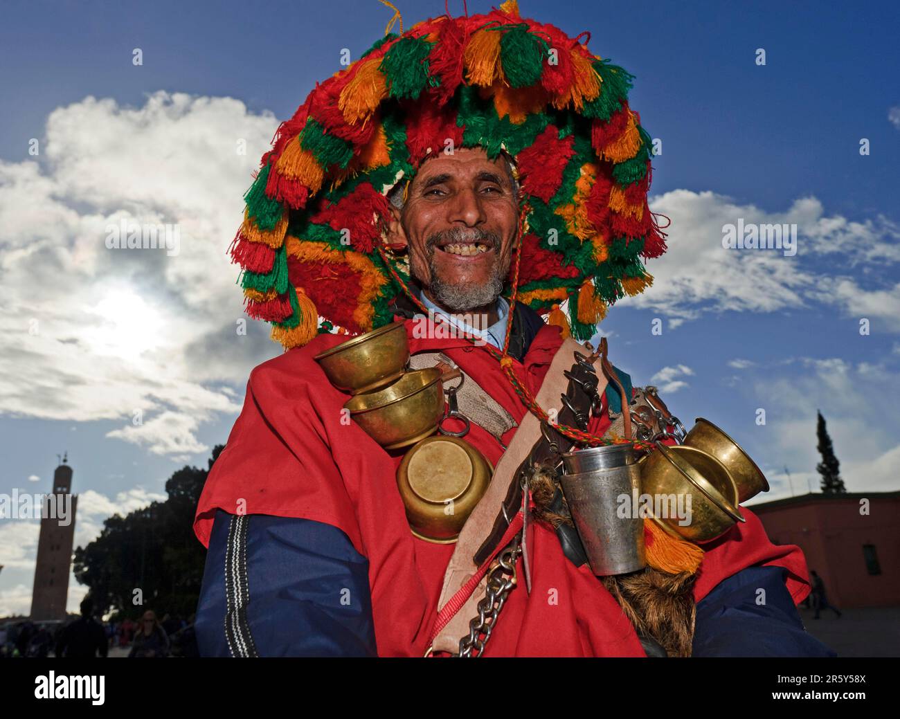 Morocco, water seller on the Place Djemaa El Fna in Marrakech Stock ...
