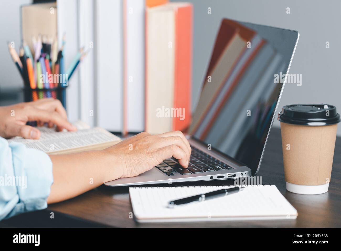 Education concept. Close up of female student make notes hand typing in ...