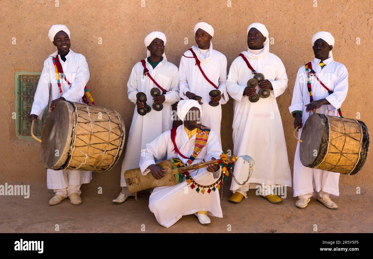 Morocco, traditional musicians with instruments, Pigeons du Sable group ...