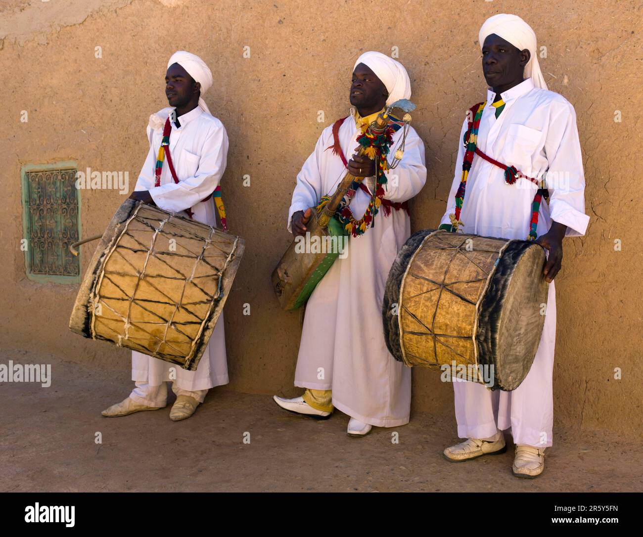 Morocco, traditional musicians with instruments, Pigeons du Sable group ...
