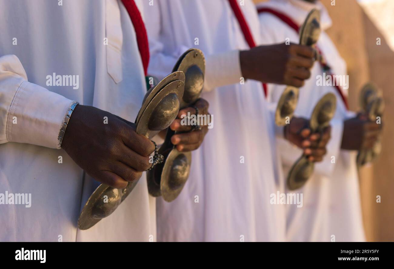 Morocco, traditional musicians with instruments, Pigeons du Sable group ...