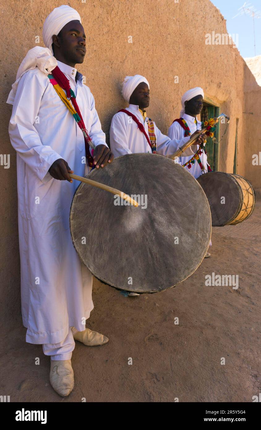 Morocco, traditional musicians with instruments, Pigeons du Sable group ...