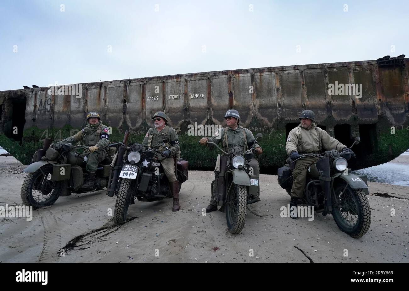 World War Two reenactors beneath a section of the Mulberry harbour on ...