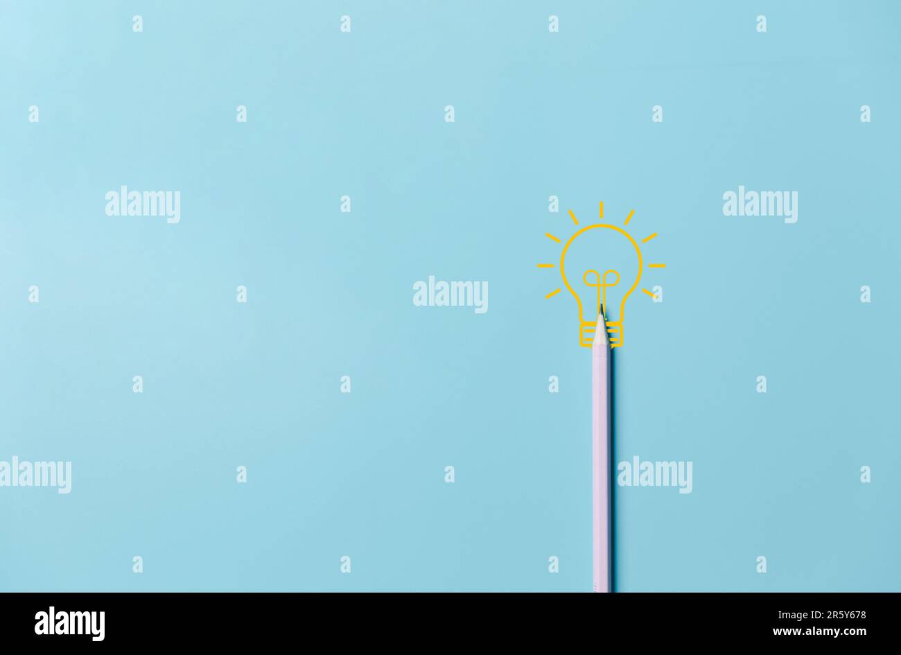 Pencil with light bulb and word idea on blue background. Creativity ...