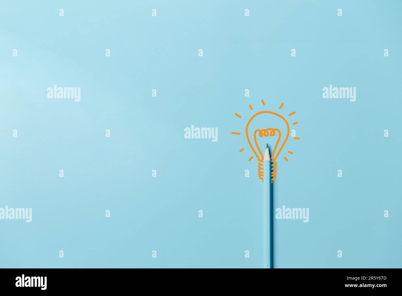 Pencil with light bulb and word idea on blue background. Creativity ...