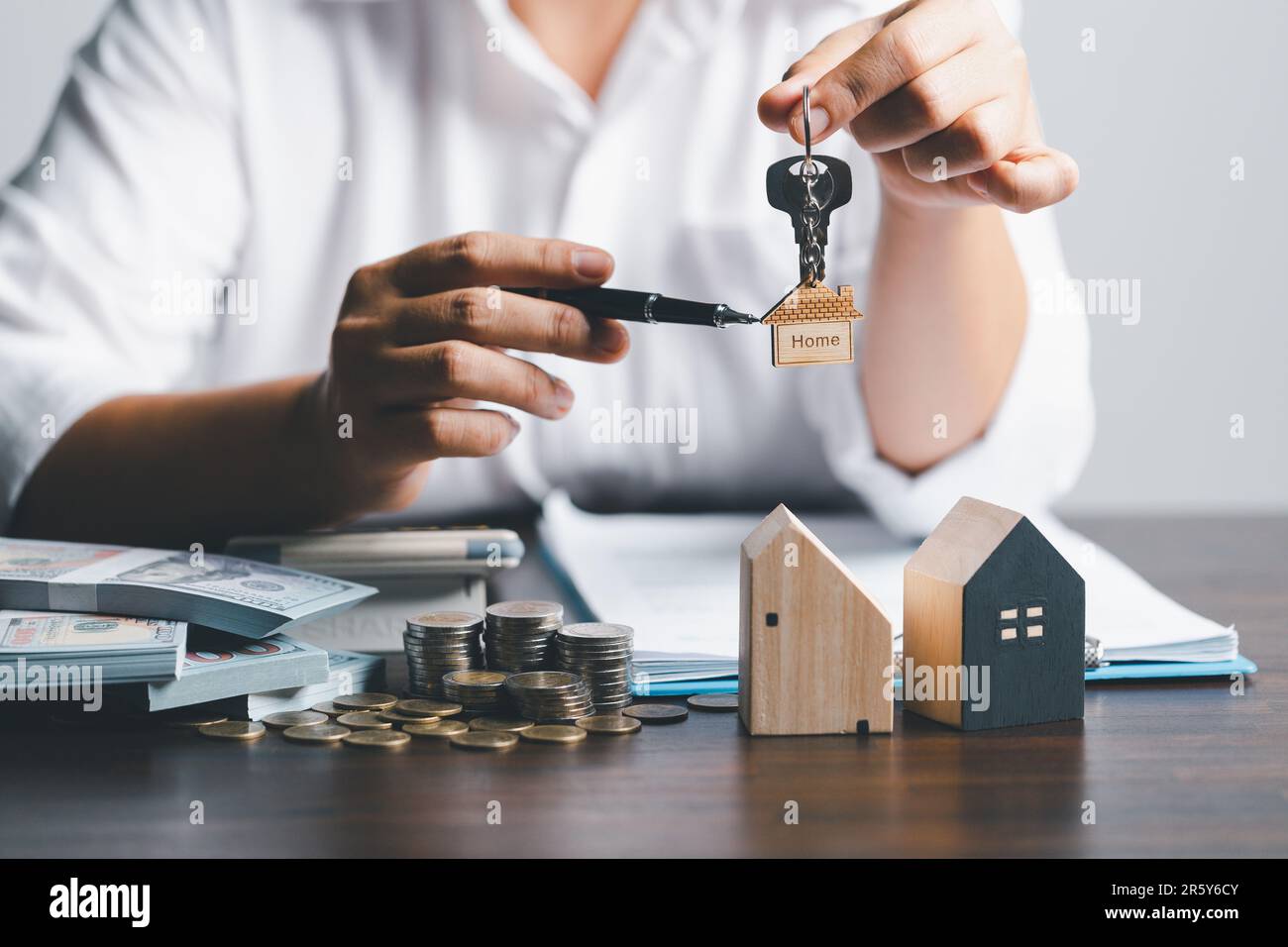 The house selling broker holds the keys and model house is given to the ...