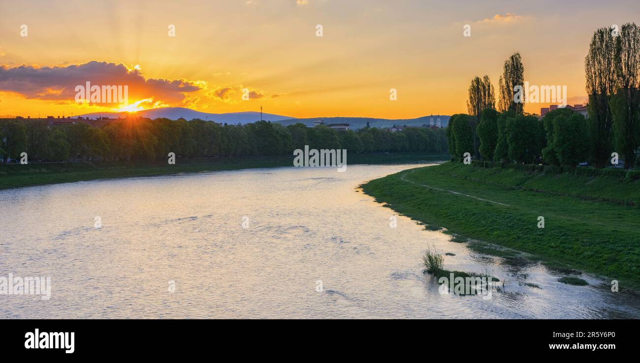 gorgeous sunrise on the waterfront of river uzh. beautiful urban ...