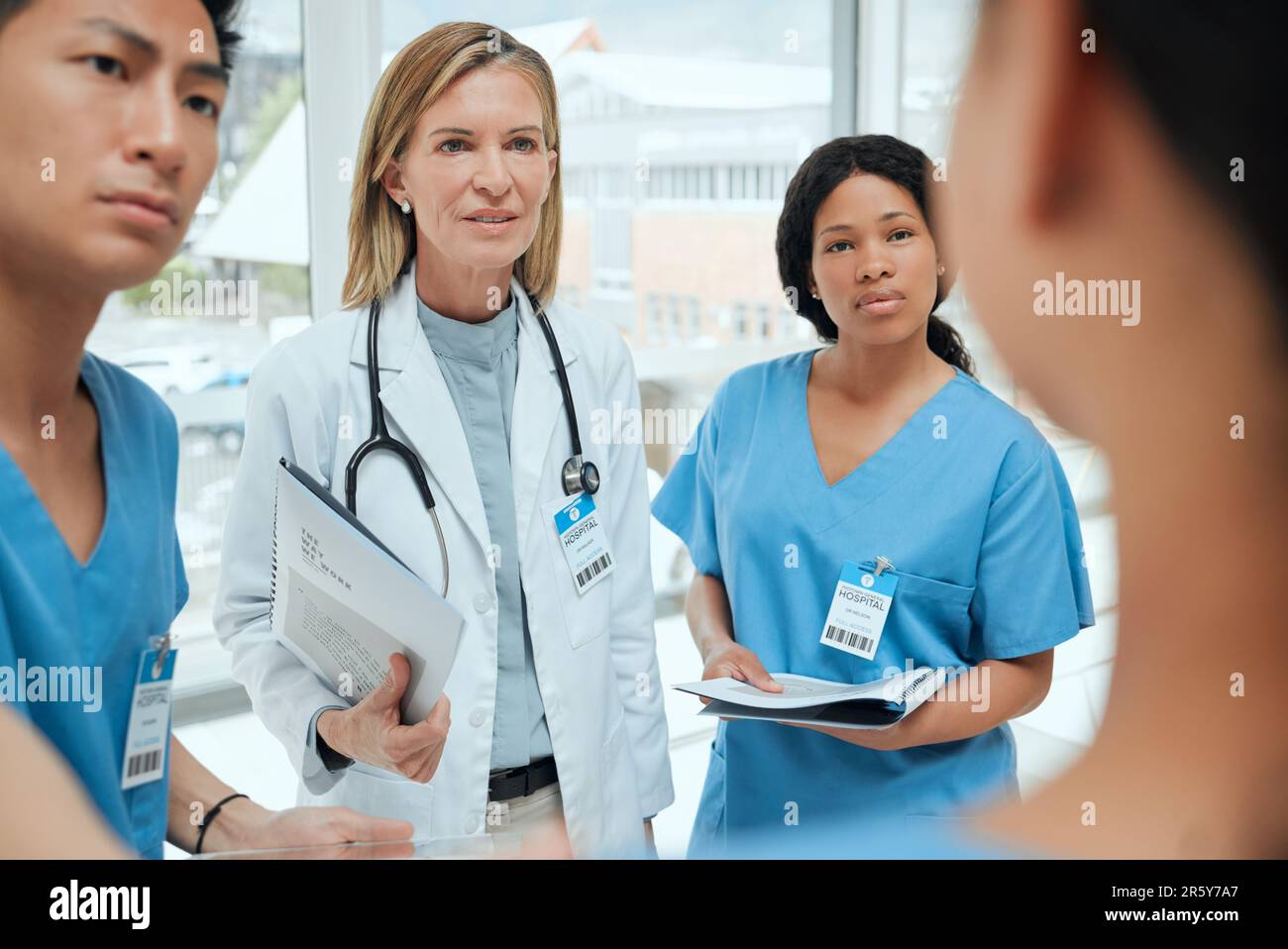 Teamwork, talking or doctors with leadership in meeting planning a ...