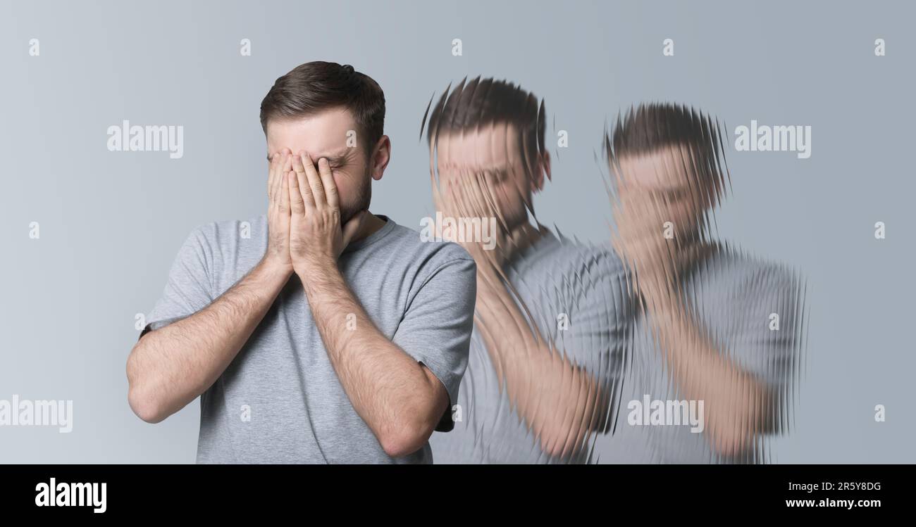 Scared man having hallucination on light grey background. Distorted ...