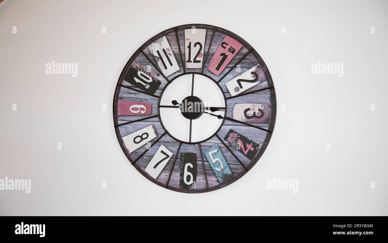 Vintage timer round old big retro wooden Clock in wall interior with ...