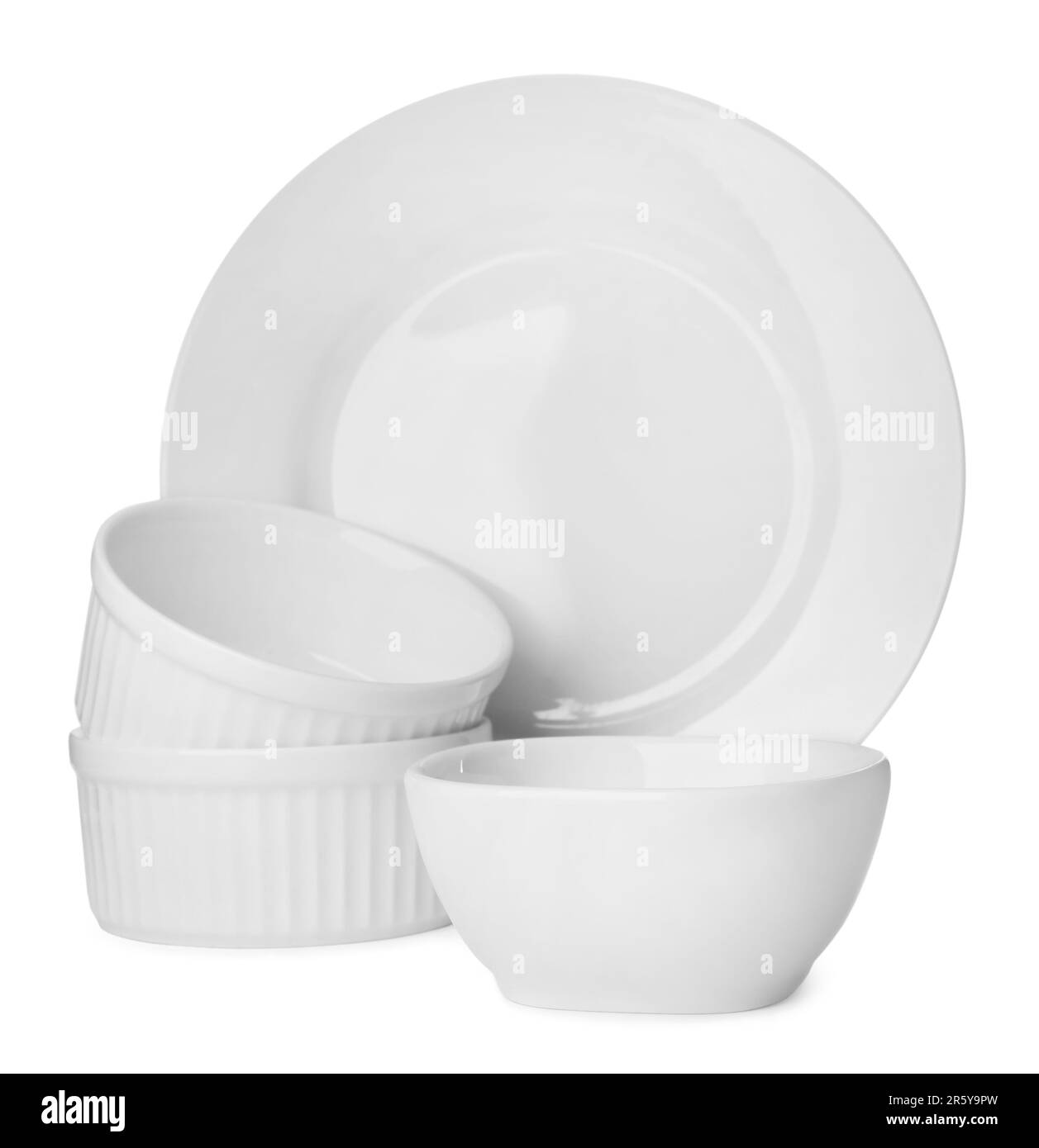 Set of clean tableware on white background Stock Photo - Alamy